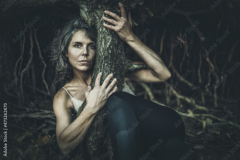 Sexy woman as a part of tree. Stock Photo | Adobe Stock