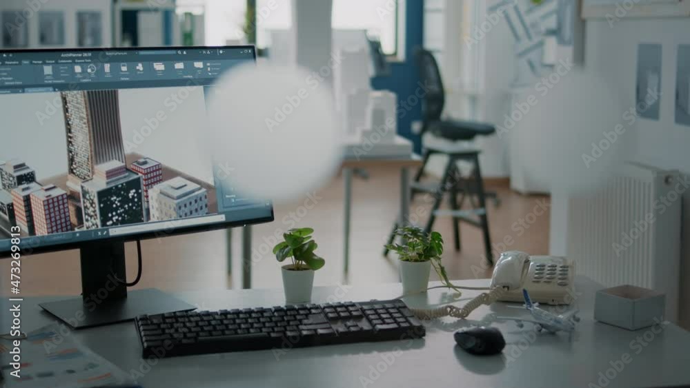 Close up of 3d building model on computer screen in empty office for ...
