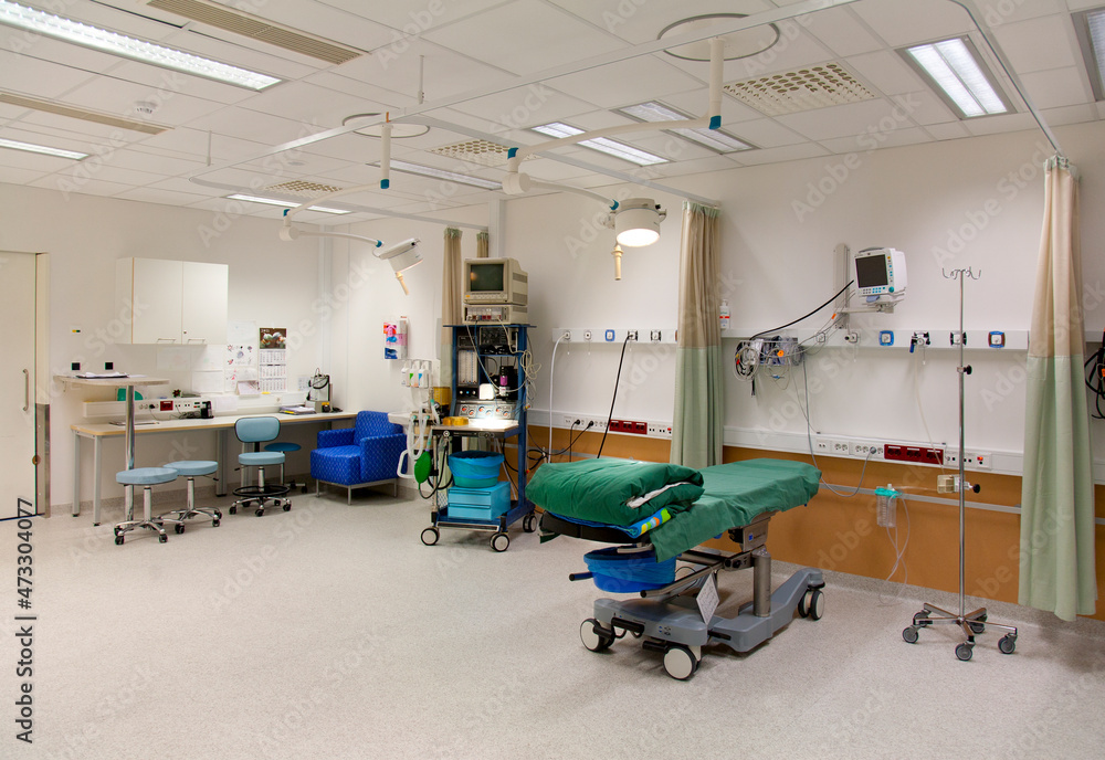 Patient facilities in a modern hospital, beds and patient bays ...