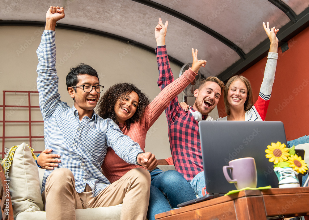 four happy friends exulting for something, good news and achievement ...