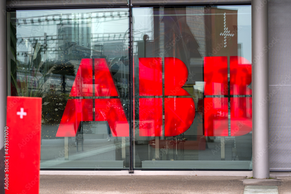 Logo of industry and energy company ABB at entrance of office building ...