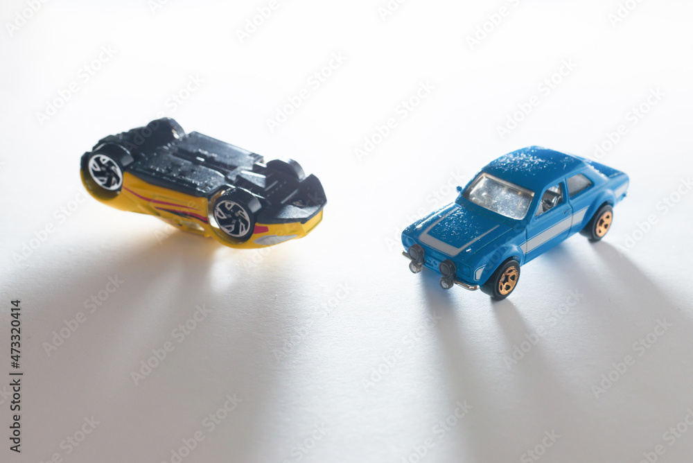 Car crash between a yellow car and a blue car.Close up two car accident ...