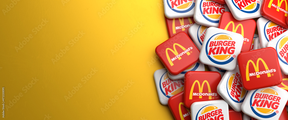 Logos of the competing American fast-food restaurant chains McDonald's ...