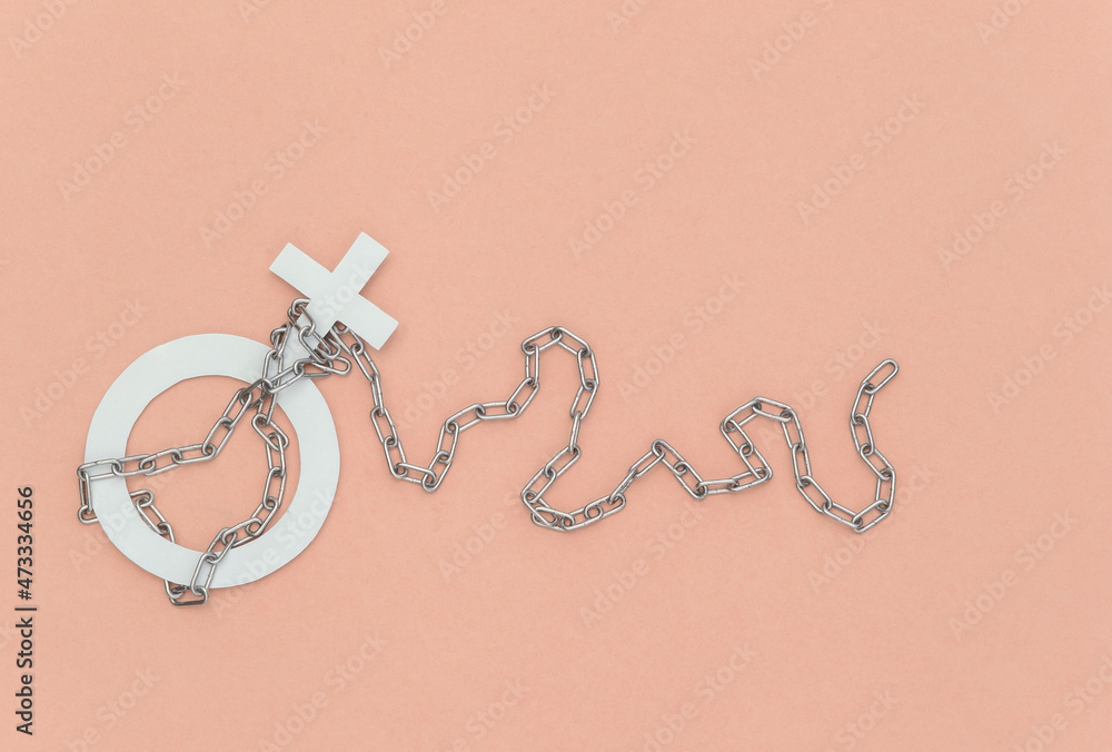 Gender female symbol wrapped in a steel chain on a blue background ...