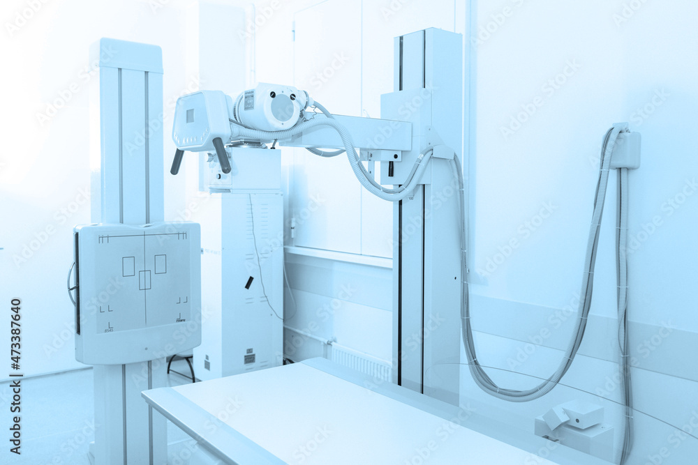 X-ray department in modern hospital. Radiology room with scan machine ...