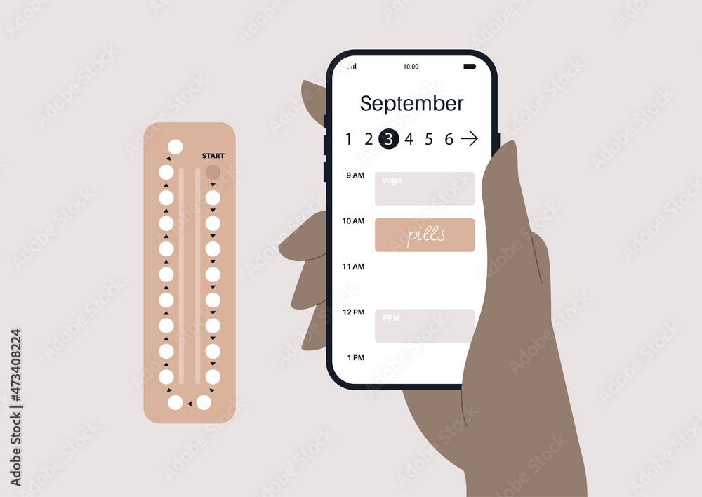 Birth control pills, a hand holding a mobile phone with a calendar ...