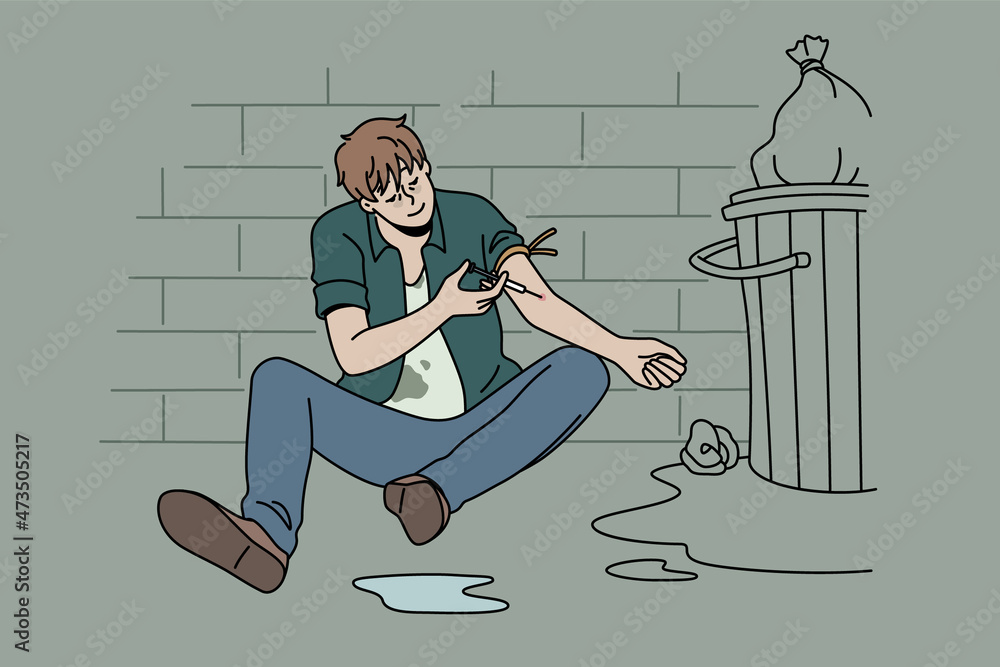 Drug addict and narcomaniac concept. Young man drug addict sitting on ...