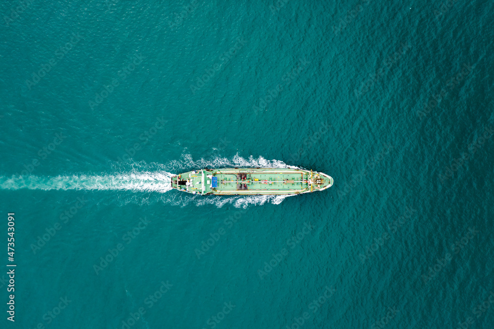 Aerial top view Oil ship tanker full speed with beautiful wave and ...