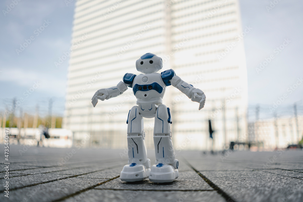 Mini robot on a square in the city Stock Photo | Adobe Stock
