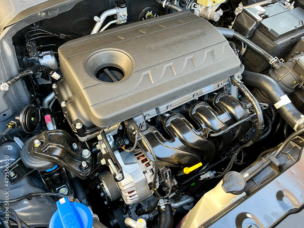 The engine compartment of the car, a view of the engine. Four-cylinder ...