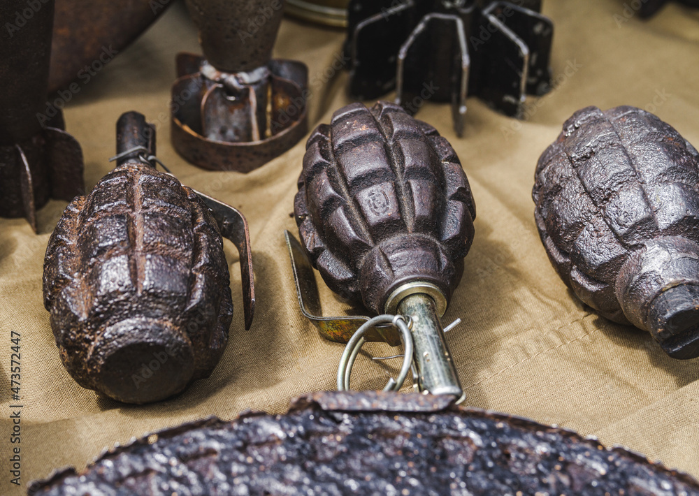 Old hand grenades and other weapons memorabilia. Vintage military ...
