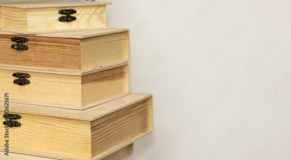 a stack of wooden boxes with iron lock placed one over another. art ...