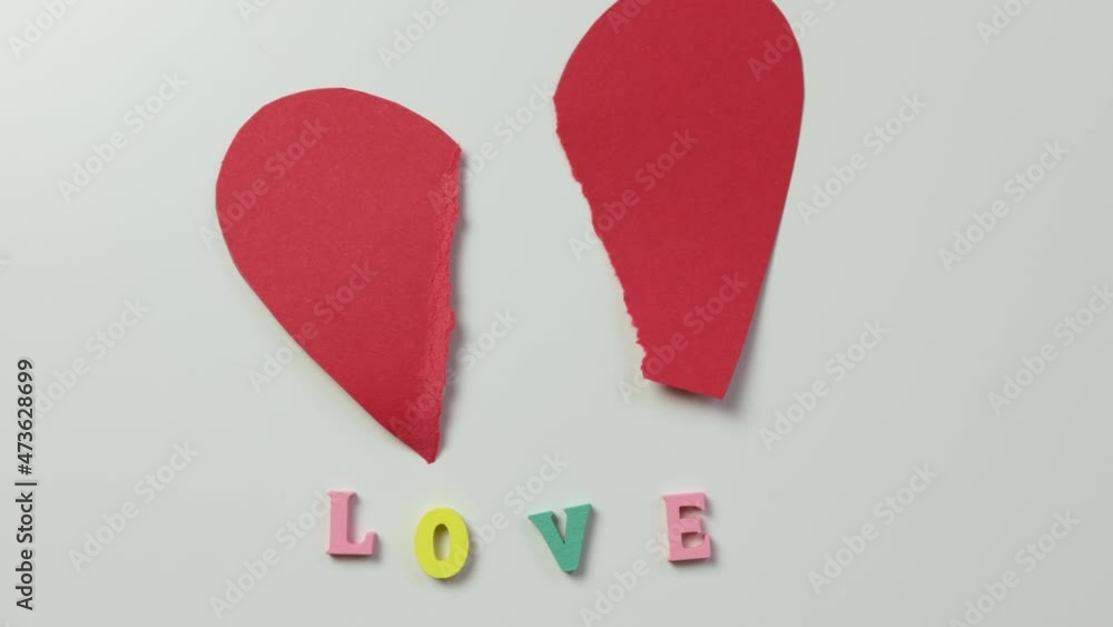 word love composed of wooden colorful letters and falling down two ...