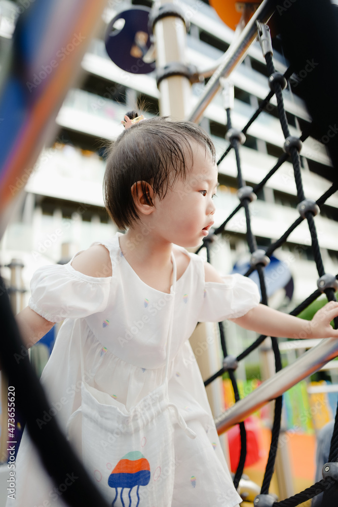 baby passing through the rope zone alone Stock Photo | Adobe Stock