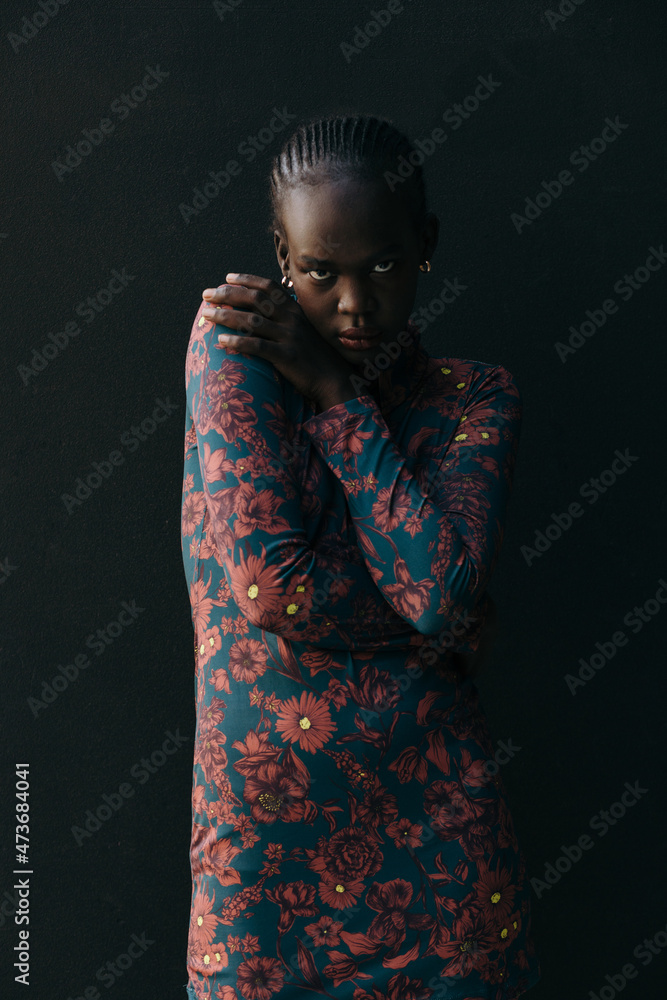 Dark portrait in black background Stock Photo | Adobe Stock