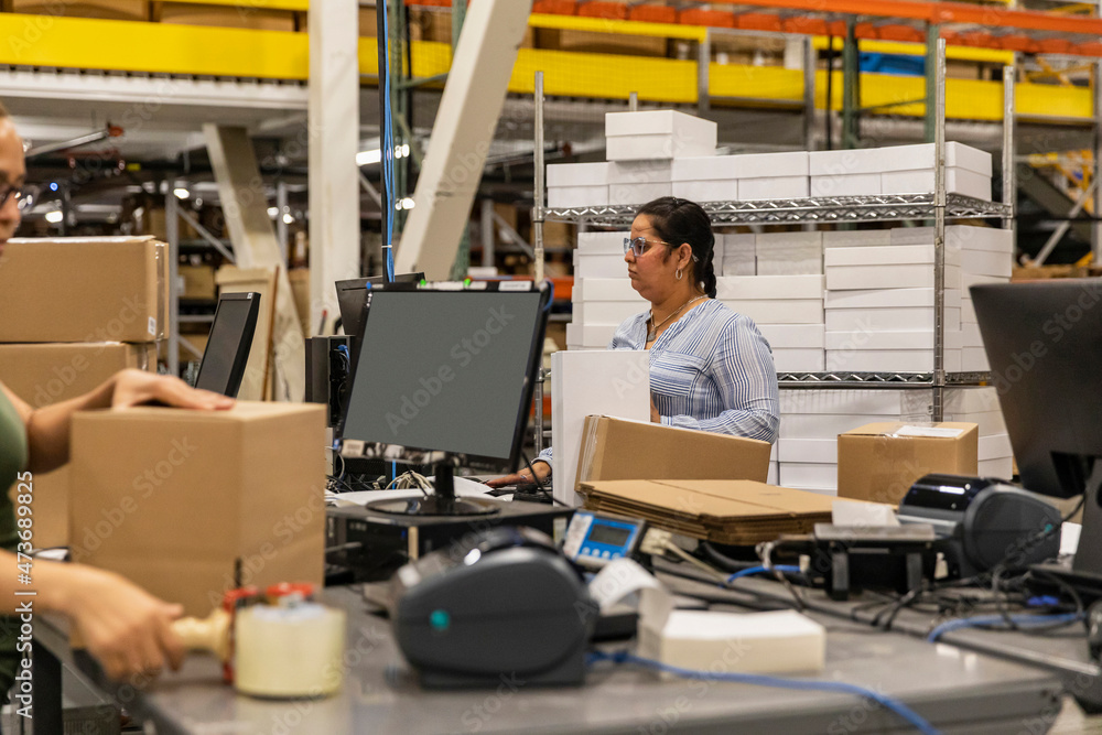 Shipping Station at warehouse for E- Commerce Stock Photo | Adobe Stock