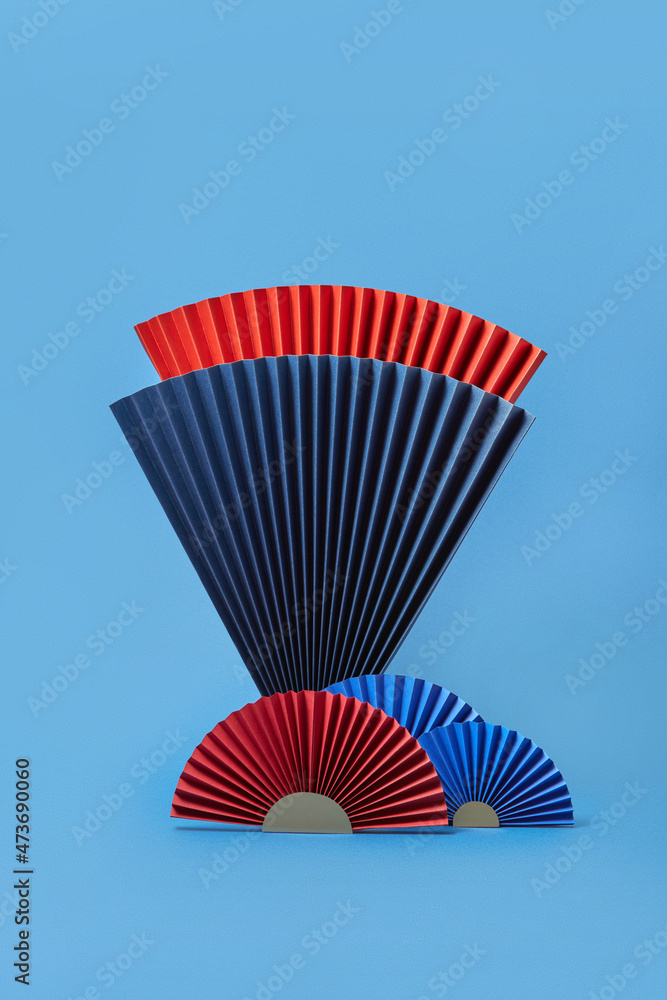 Blue and red origami fans Stock Photo | Adobe Stock