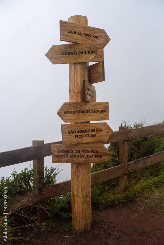 Faial Island world directions and distance totem Stock Photo | Adobe Stock