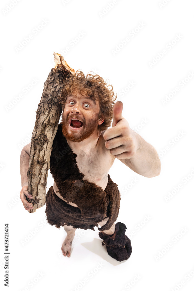 Full-length portrait if cheerful man in character of neanderthal ...