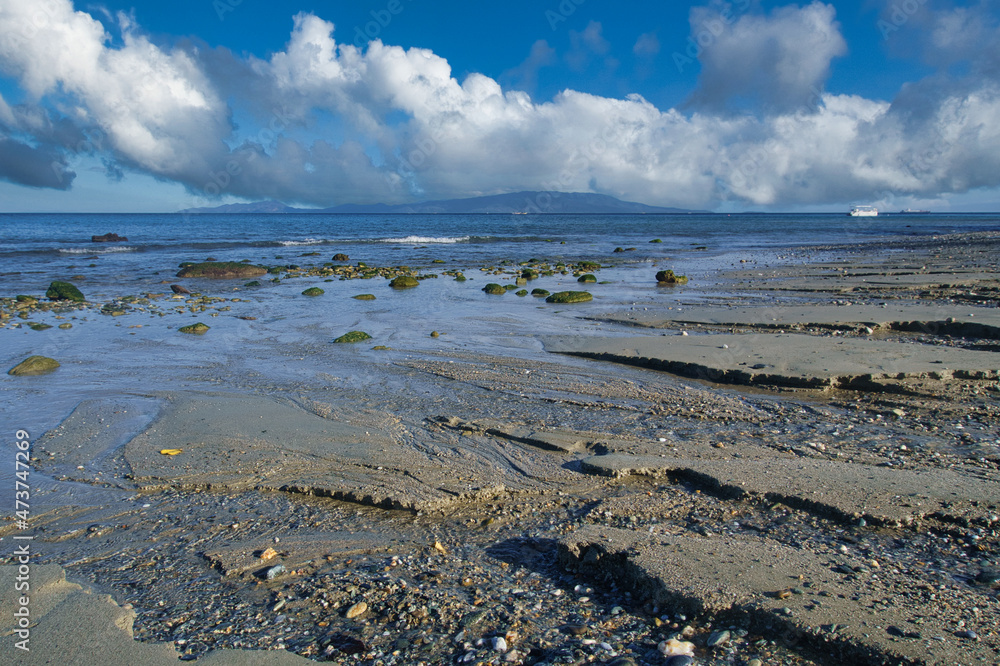 Early morning low tide at Aninuan Beach., the Philippines. The clouds ...