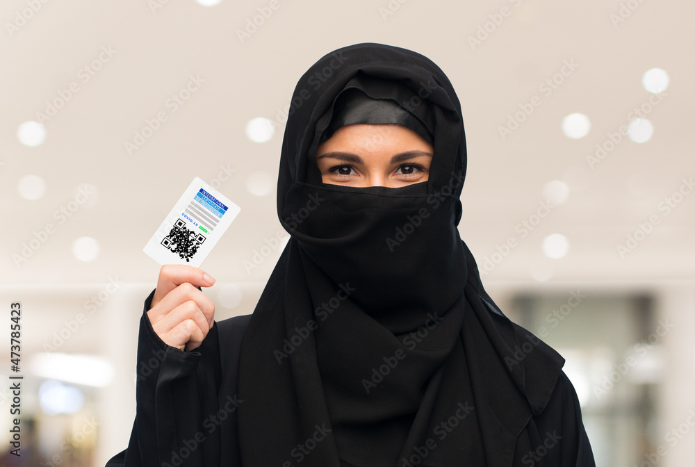 pandemic, health and people concept - woman in hijab with immunity ...