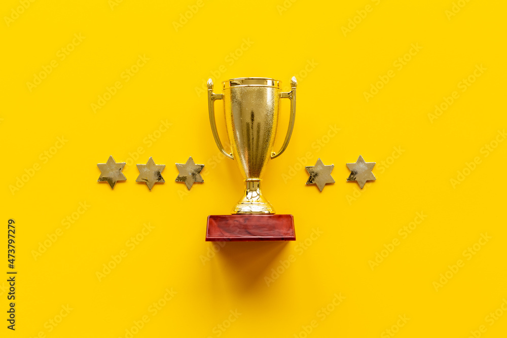 Five stars rating and winner trophy cup. Award and success concept ...