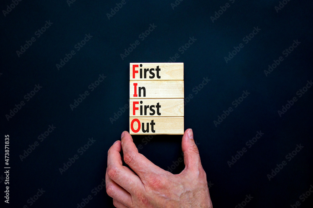 FIFO first in first out symbol. Concept words FIFO first in first out ...