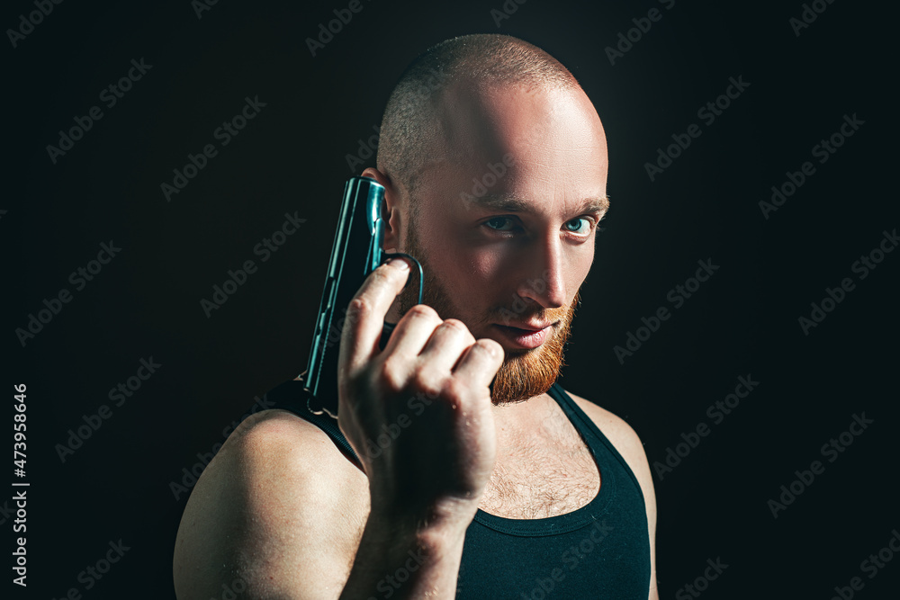 Man shooting firearm handgun, makarov pistol in a firing range ...
