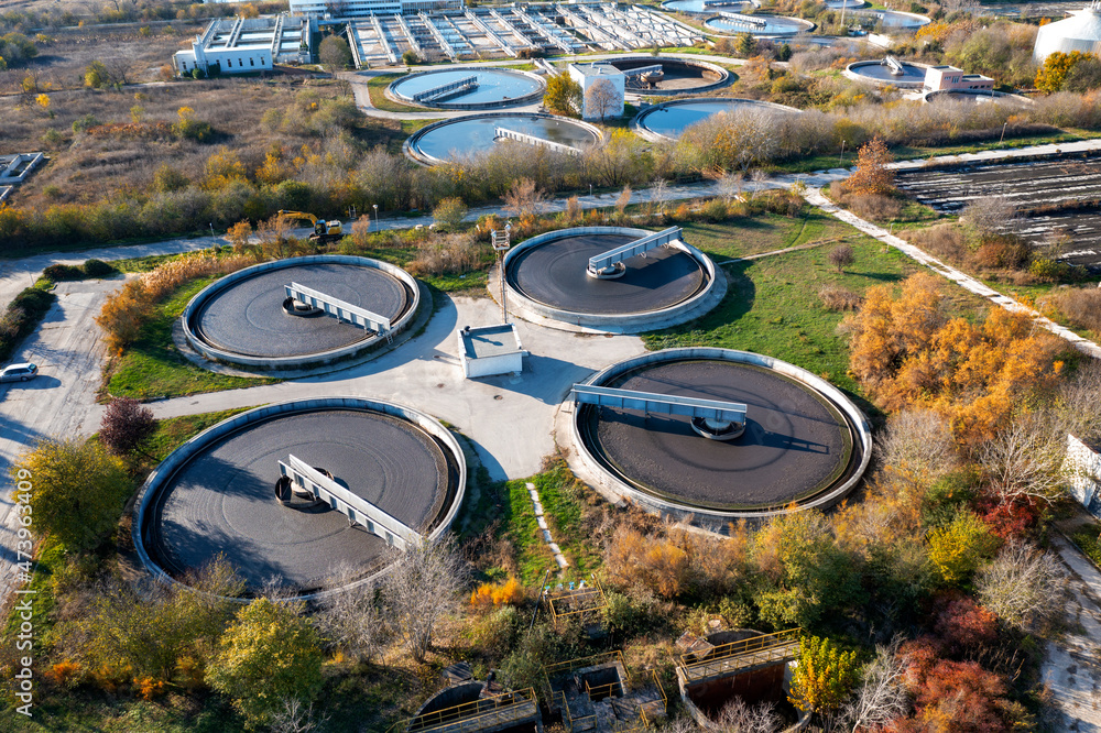 Aerial top view of a city sewage treatment plant. A group from the big ...