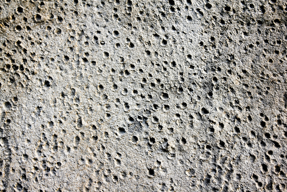 Concrete wall with small holes in black and white. Stock Photo | Adobe ...