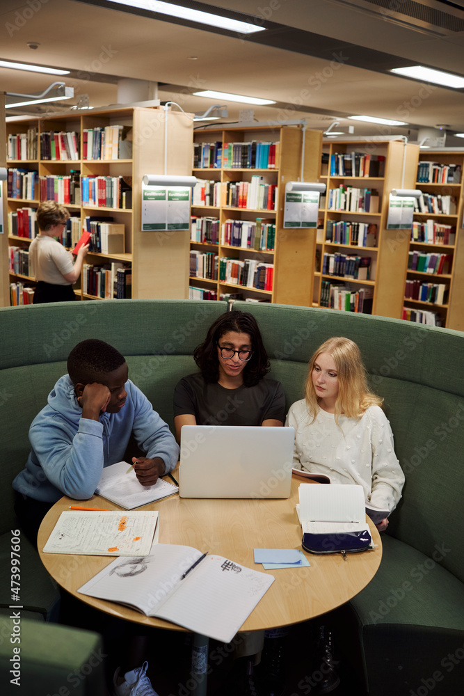 Students learning together in library Stock Photo | Adobe Stock