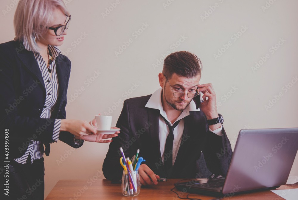 Sexual harassment in office. Young beauutifuul female secretary ...