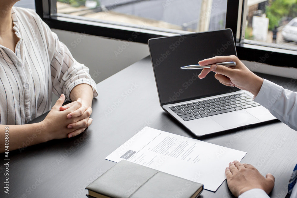 Reviewing the resume of applicants who are interviewing for an ...