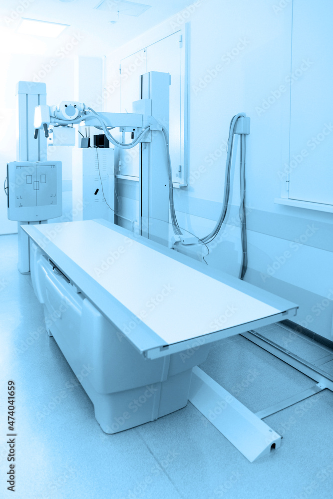 X-ray department in modern hospital. Radiology room with scan machine ...