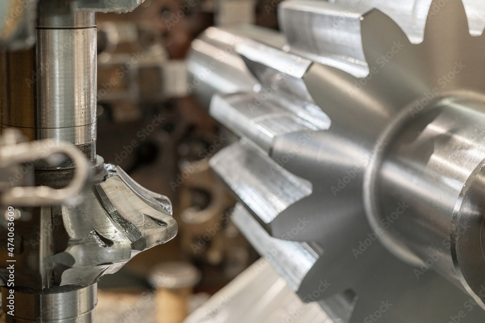 Manufacturing and cutting of a gear shaft tooth on an oil-cooled gear ...