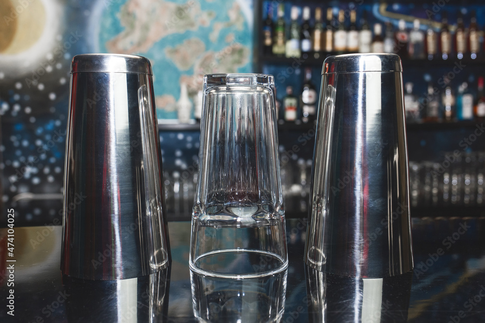 2 shakers of bar instruments for mixing and preparing alcoholic ...