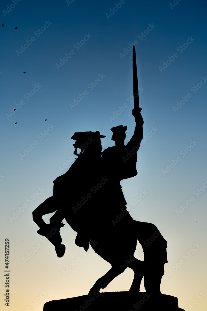 King raising sword on prancing horse - statue silhouette on Bratislava ...