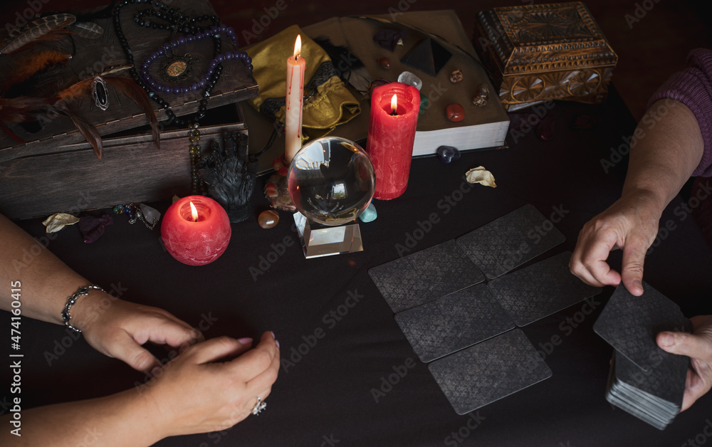 Altar of wicca, candle, magic books, tarot cards and other witch stuff ...