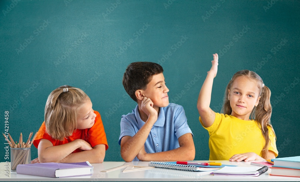 Concept of education. Elementary school child, ready to answer the ...