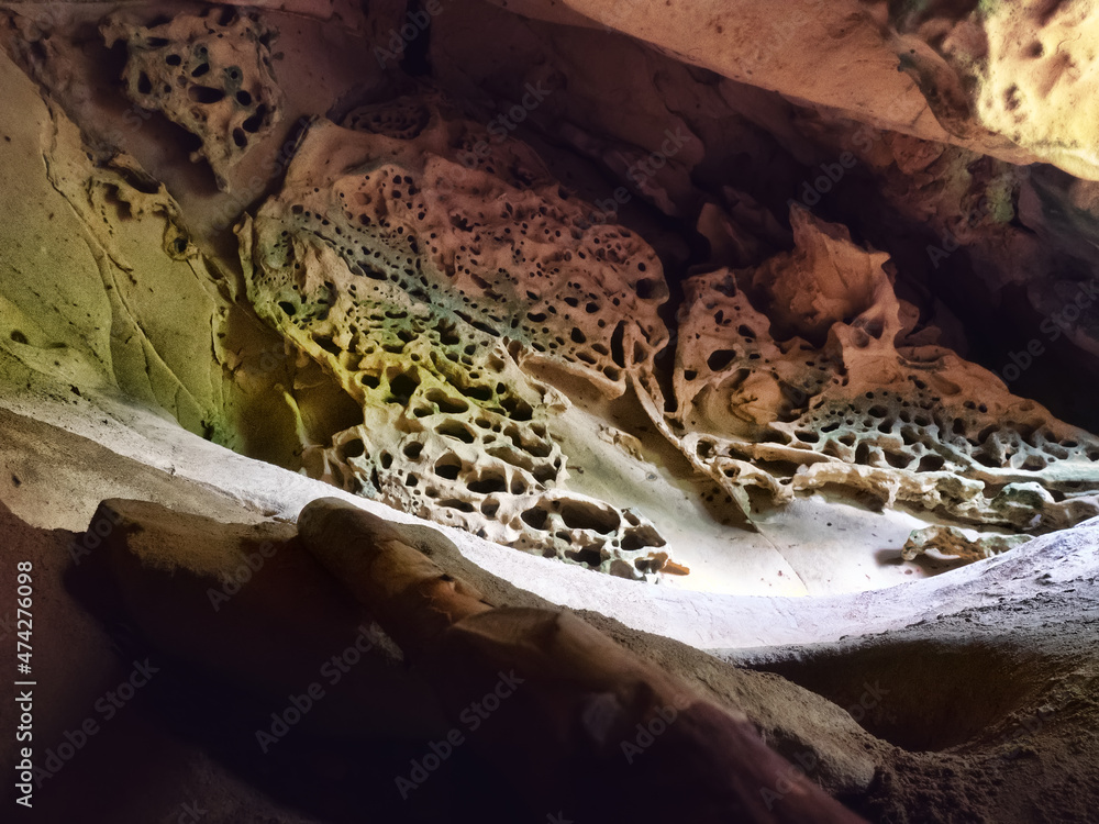 Fancy patterns made by water in a sea plaster grotto. Nature glyptic in ...