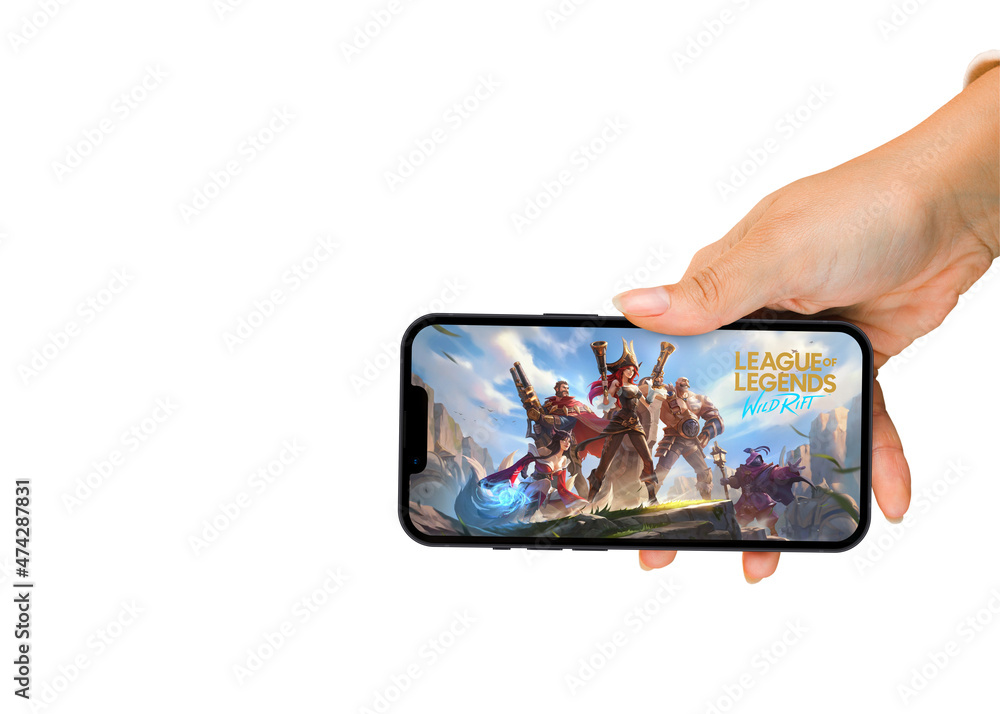 Female hand holding a smartphone with League of Legends (LOL) Wild Rift ...