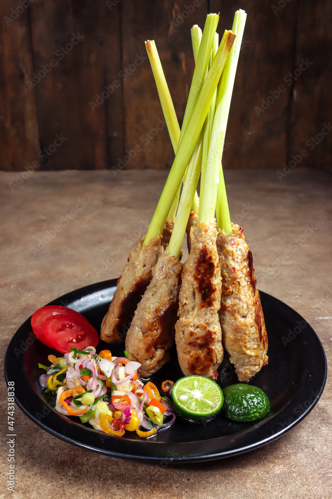 Sate Lilit, traditional Balinese minced seafood or chicken satay with ...