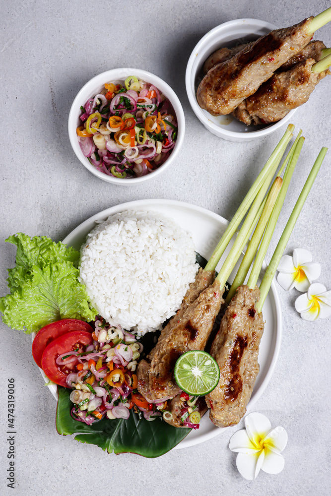 Sate Lilit, traditional Balinese minced seafood or chicken satay with ...