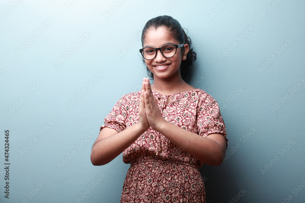 Portrait of a smiling girl of Indian ethnicity with traditional ...