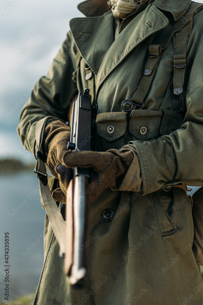 Soldier Of USA Infantry Of World War II Holds Submachine Weapon In ...
