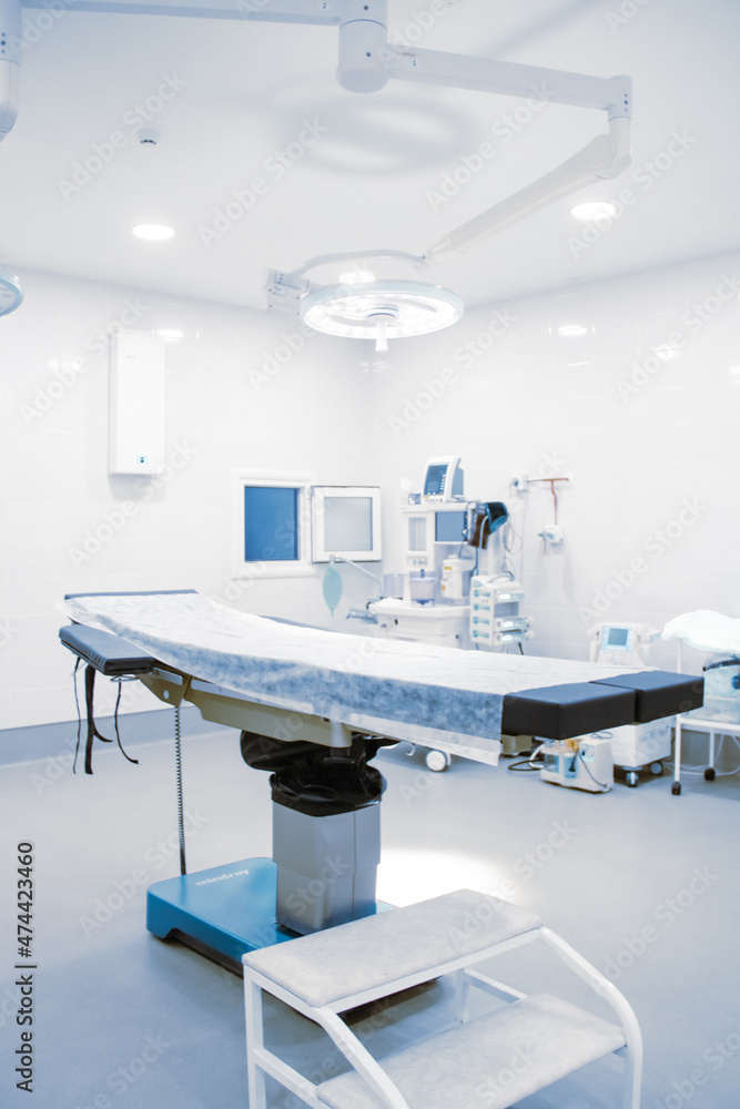 Empty operating room in a hospital. Surgical equipment with operating ...
