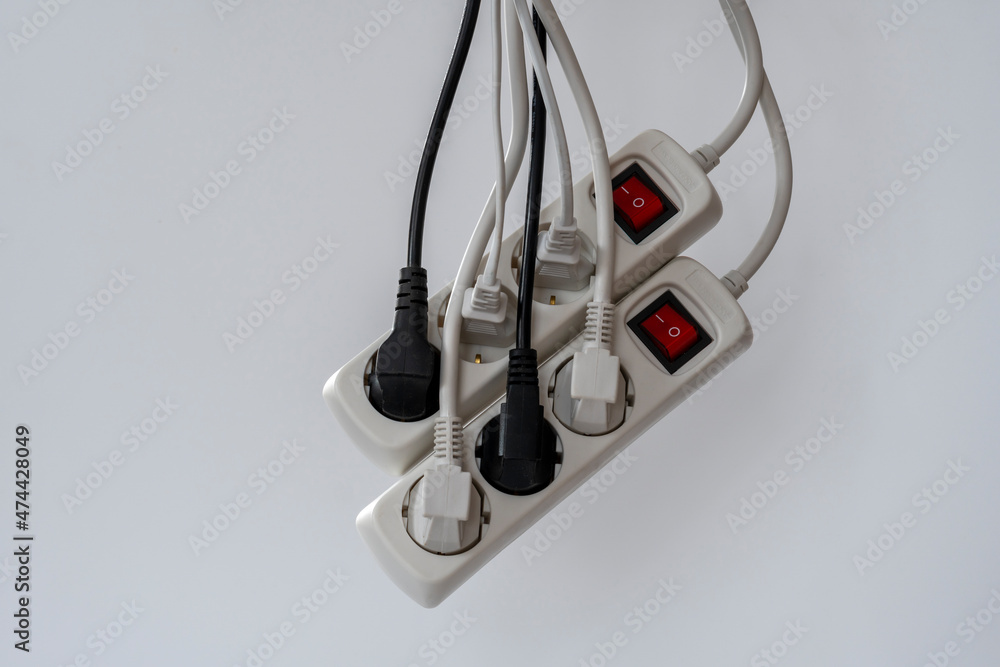 Plug the power plug, Multiple socket with connected plugs. Stock Photo ...