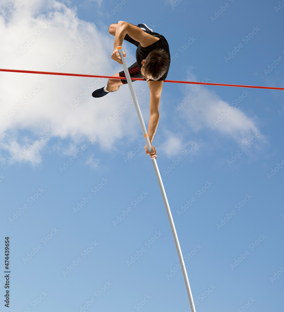 Professional pole vaulter training at the stadium Stock Photo | Adobe Stock