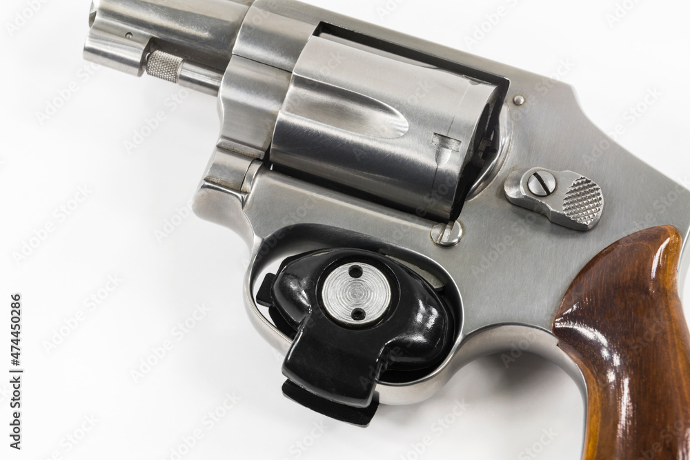 Trigger lock on 38 caliber revolver hand gun. Stock Photo | Adobe Stock