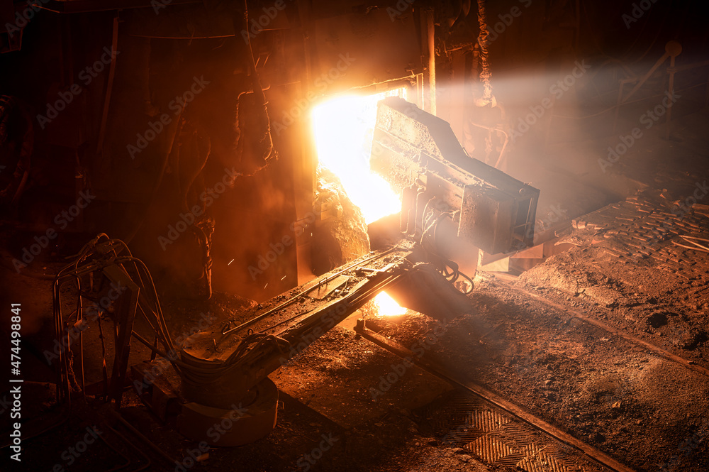 process of taking a sample of liquid metal in a steelmaking furnace ...